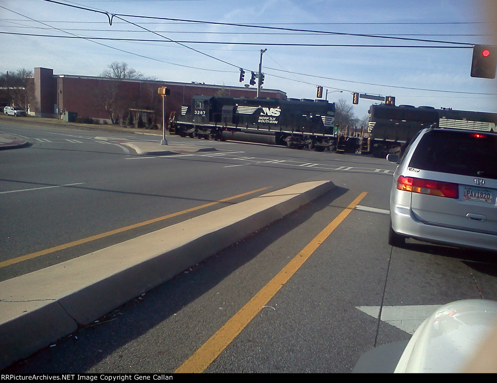 NS 3287 and 6710 crosses Glenn Milner Blvd. to go to Southeastern Mills